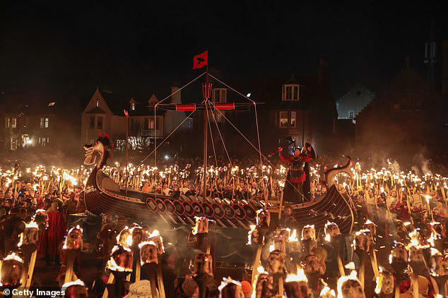 World-famous fire festival sparks to life: 'Vikings' take to the ...