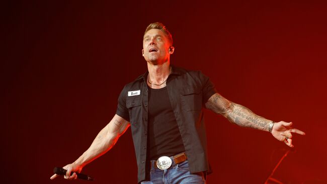 Brett Young shares moment with wife, daughters: 'My forever dance partners'