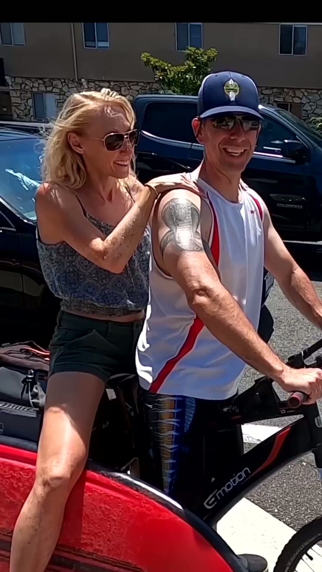 Blind guy rides a bike with his banana