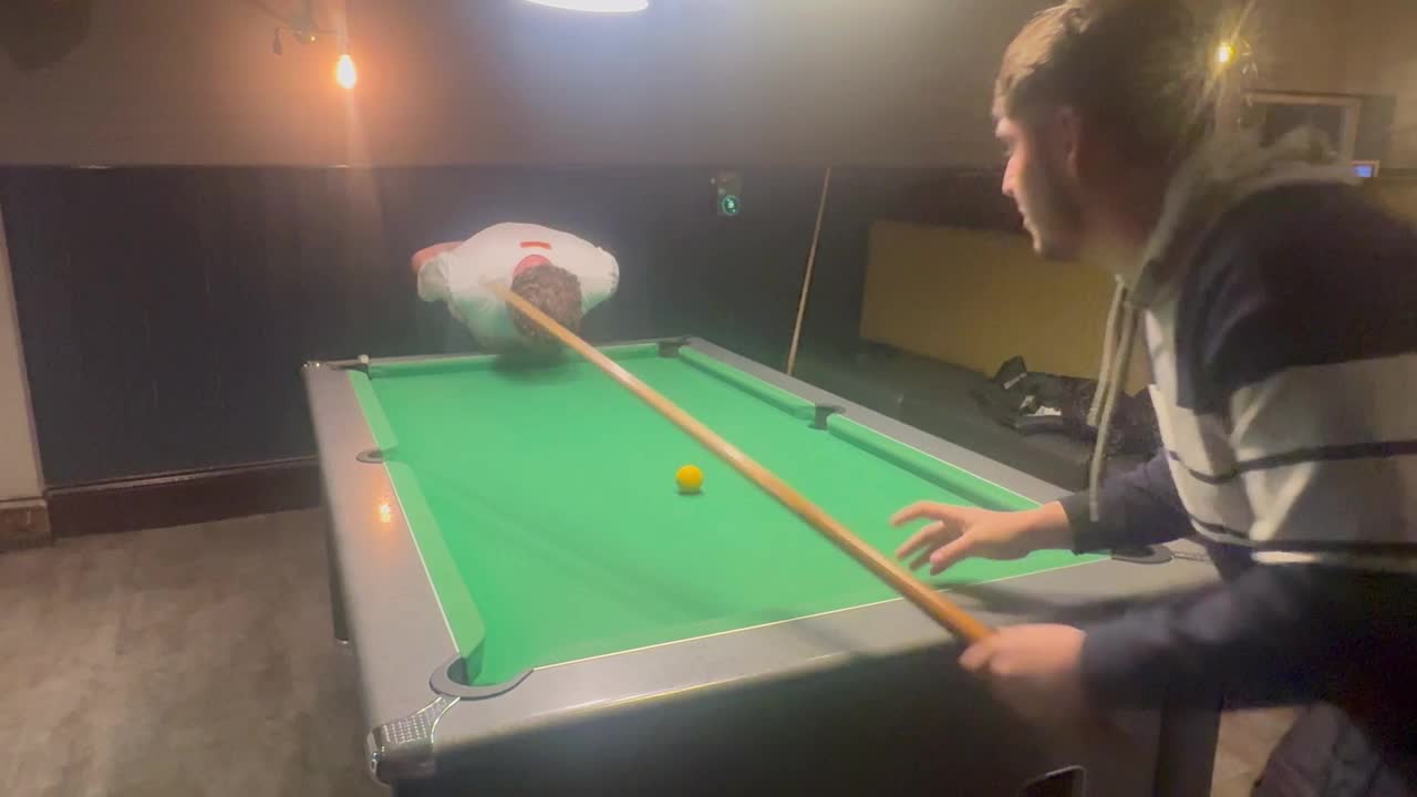 Friend takes pool ball to the head in viral 389K‑view clip