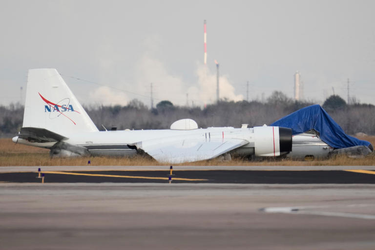 Video shows flames flying from NASA plane that touched down without ...