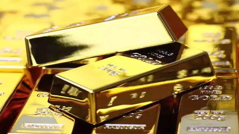 Gold prices dip after rising nearly 3% to fresh record