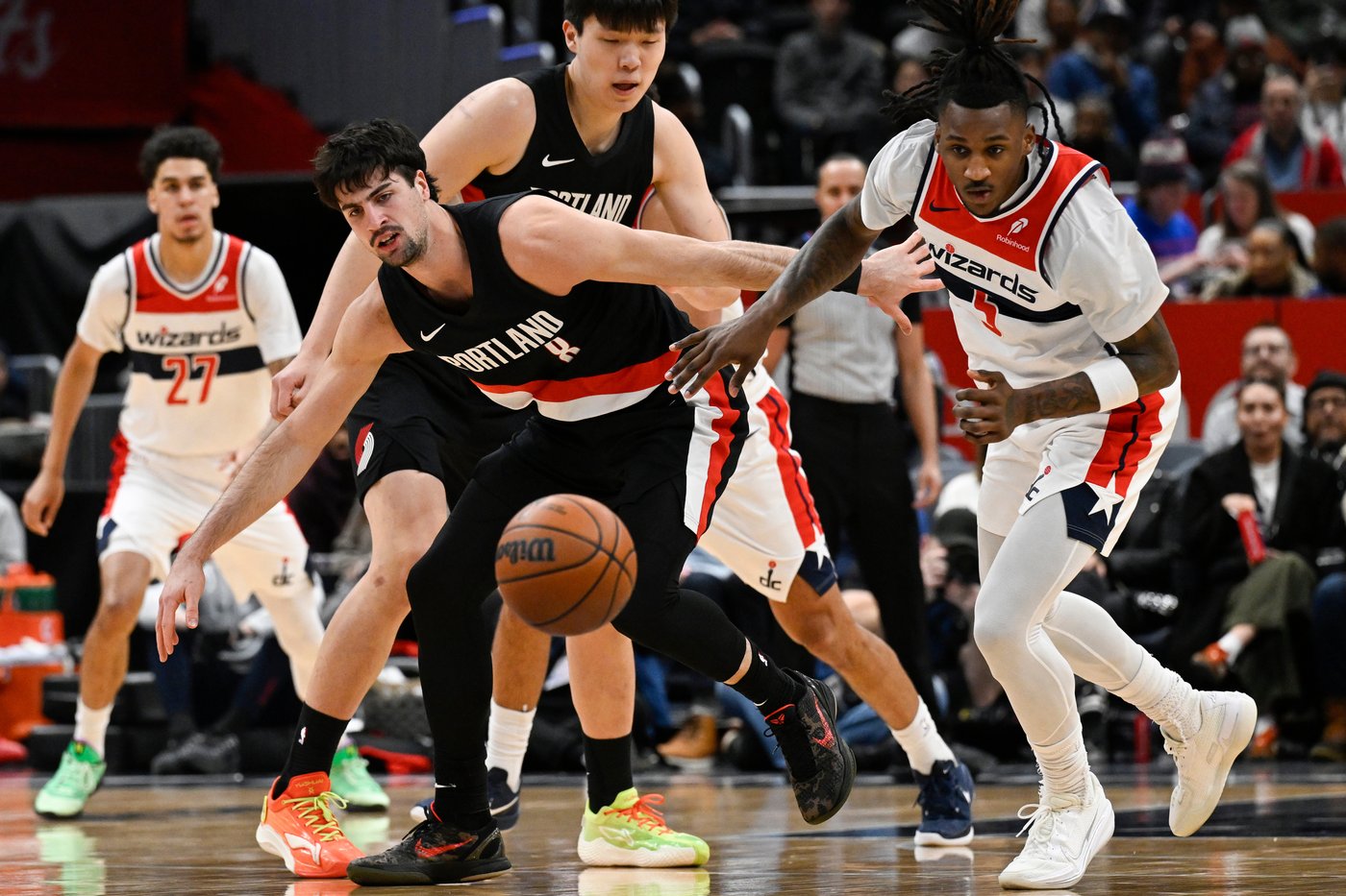 Sarr's big night helps the Wizards snap a 9-game skid with a 115-111 ...