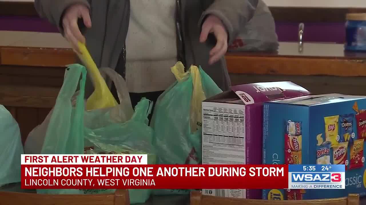 Neighbors helping one another during winter storm