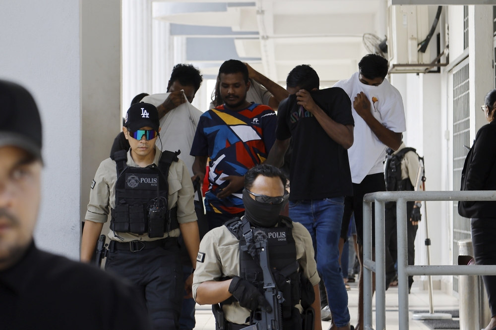 Three wanted 'Gang Captain Praba' members extradited to Malaysia after ...