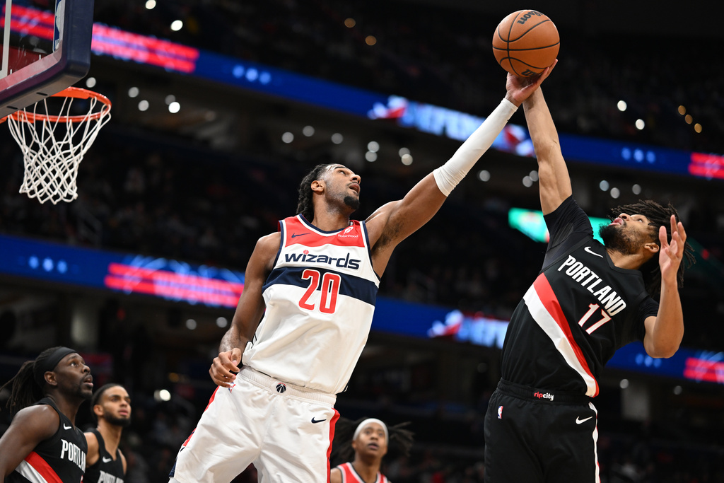 In a battle of young big men, Alex Sarr helps the Wizards snap a pair ...