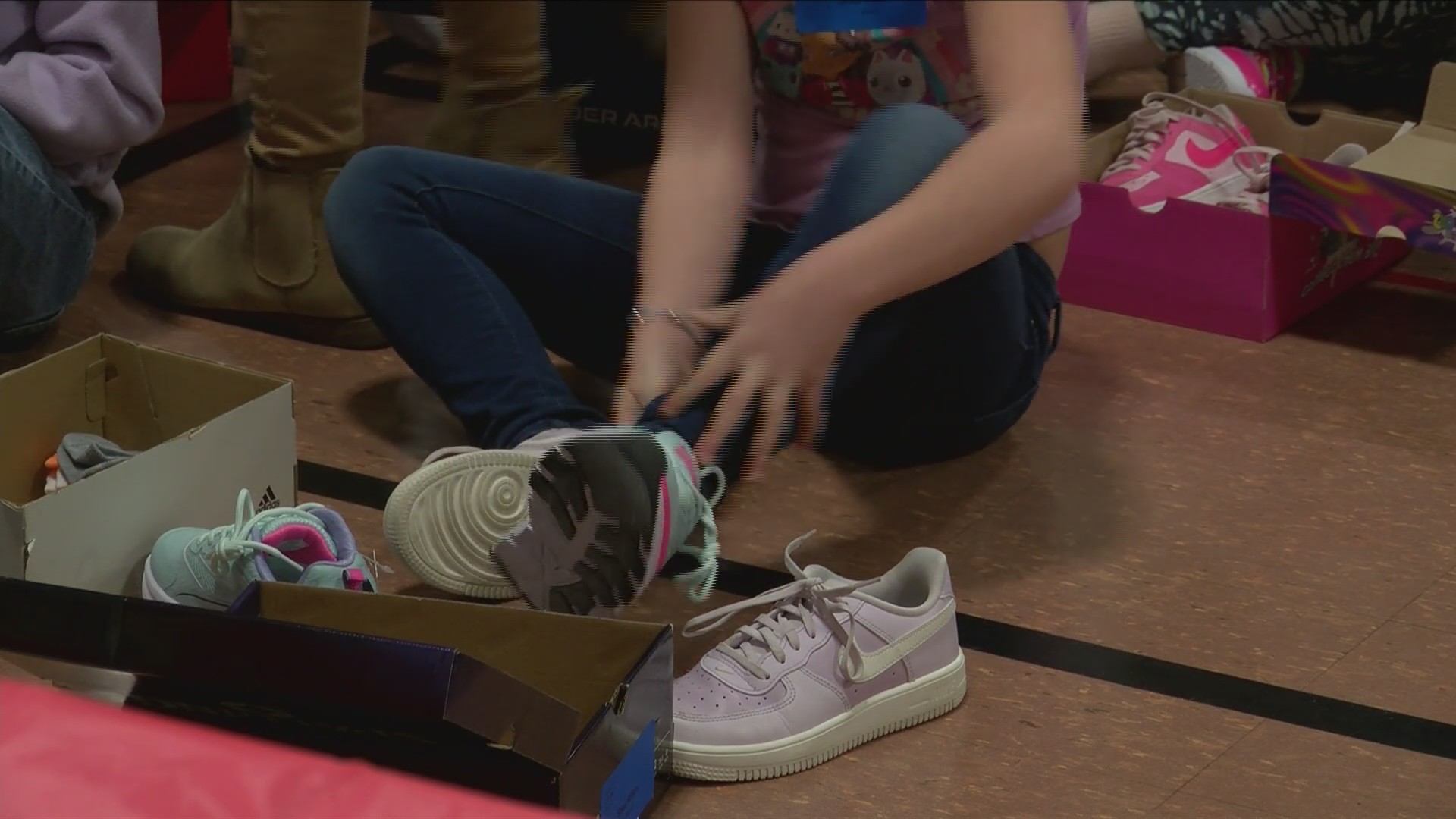 Hundreds of students receive new shoes in nonprofit's first year of ...