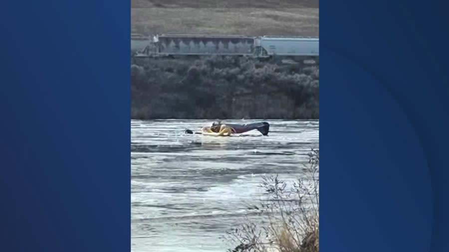 Two dead after plane hits power line, crashes into Payette River ice
