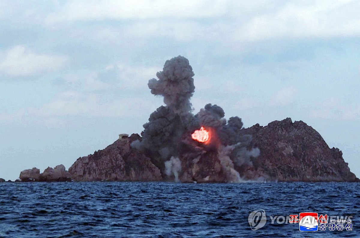 N Korea test-fires large-caliber multiple rocket launcher