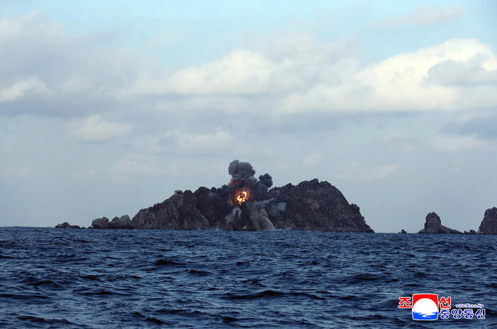 N Korea test-fires large-caliber multiple rocket launcher