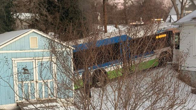 Bus slides into shed in Roanoke, no injuries reported