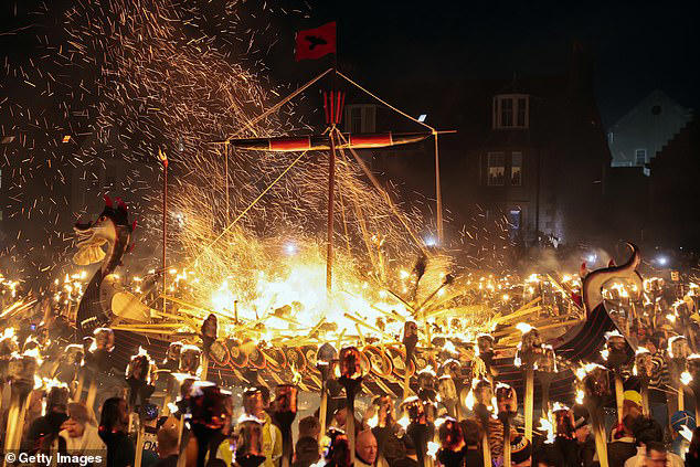 World-famous fire festival sparks to life: 'Vikings' take to the ...