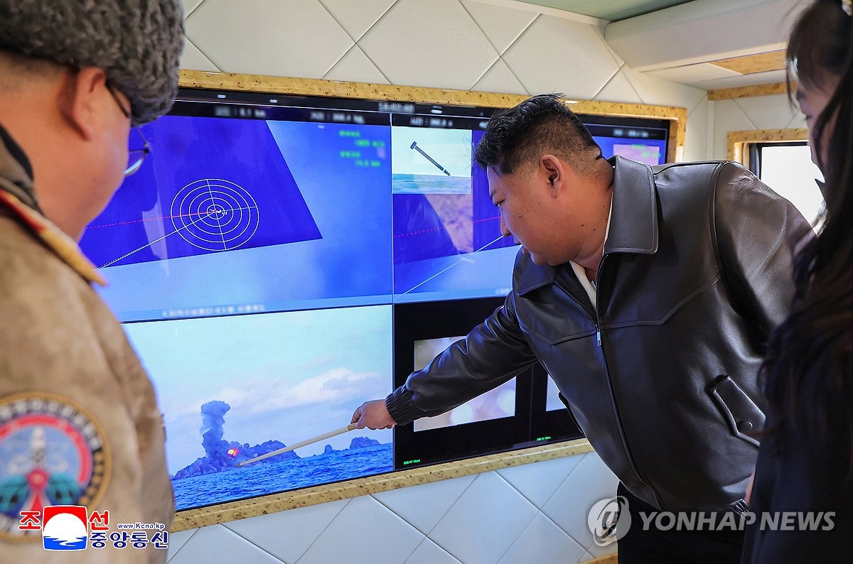 N Korea test-fires large-caliber multiple rocket launcher