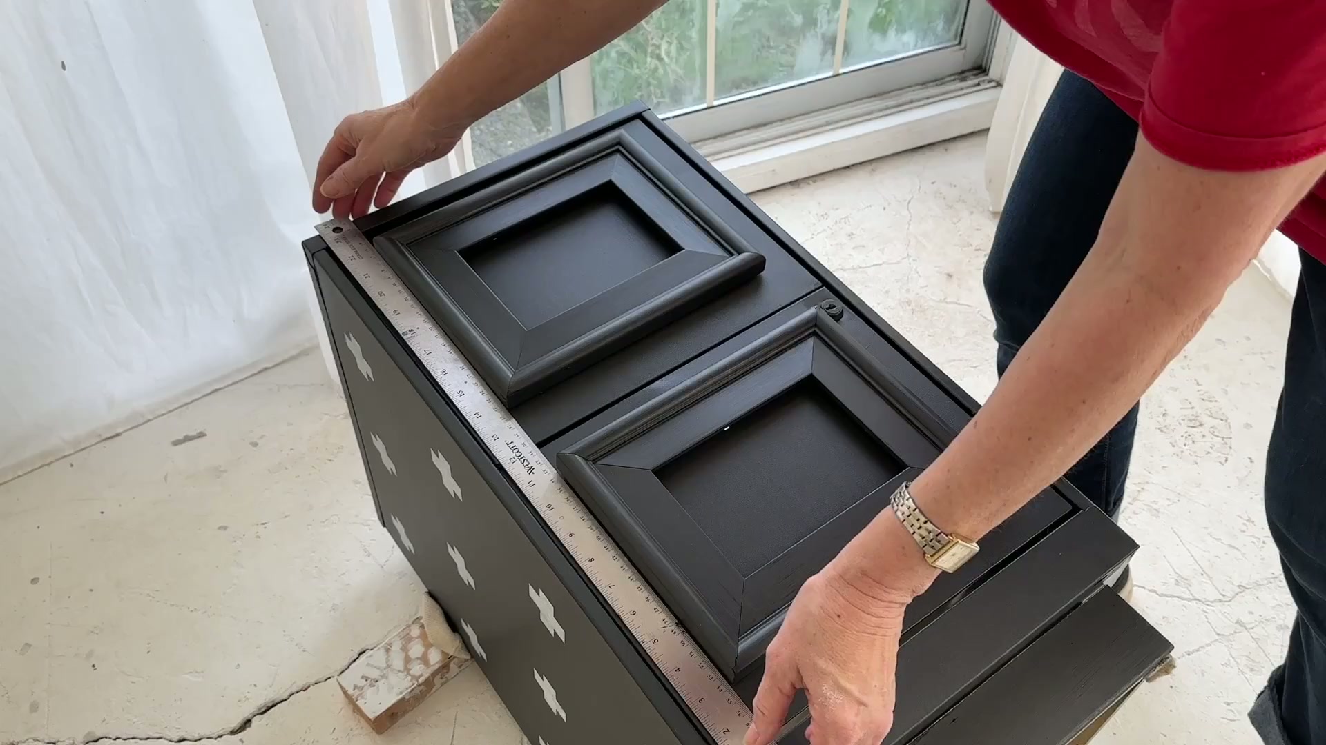 Put a picture frame on a file cabinet (this is brilliant!)