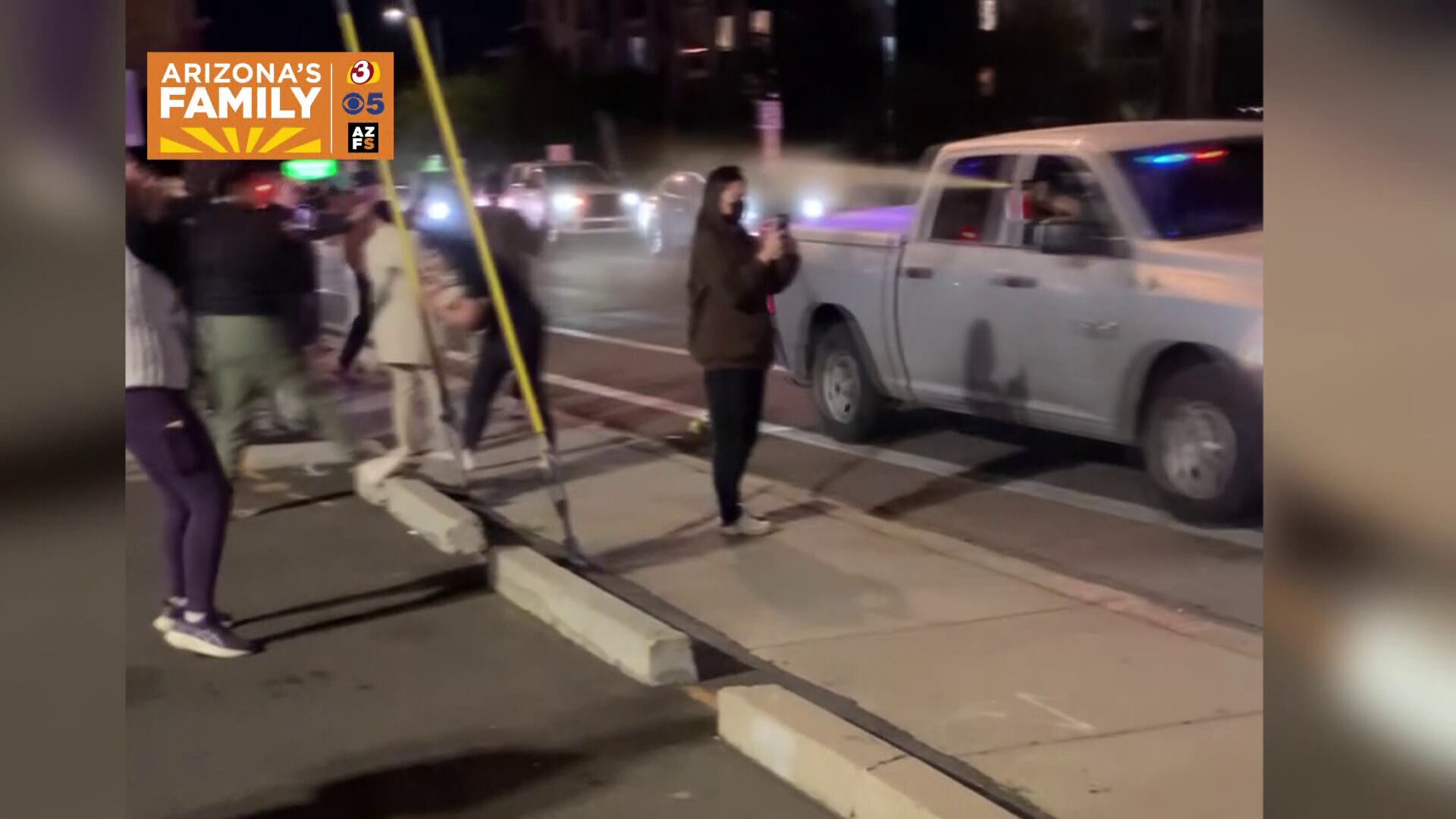 Video: HSI agent sprays protesters after Zipps raid in north Phoenix