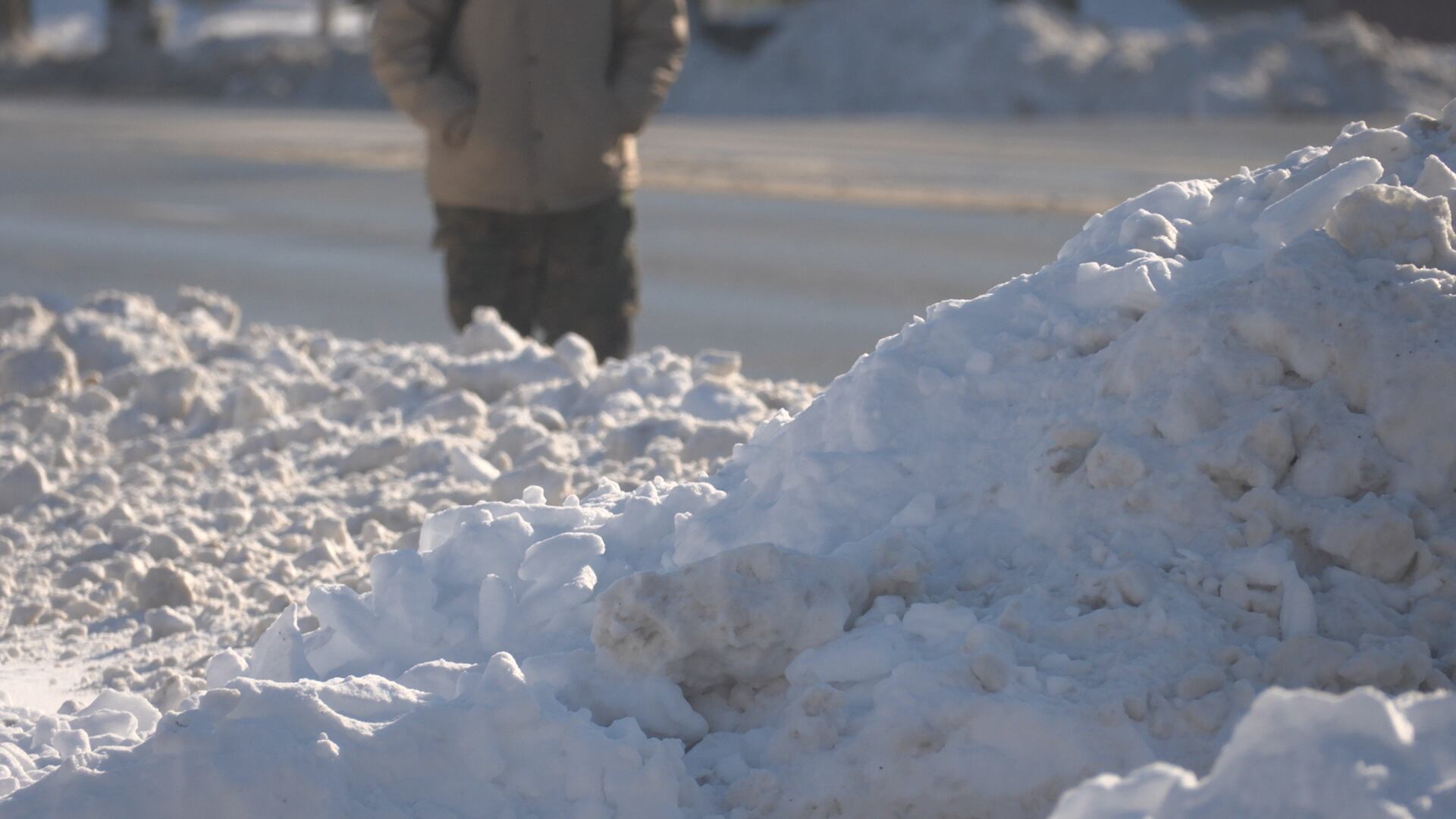 Sidewalks across Louisville remain covered in snow, with cold ...