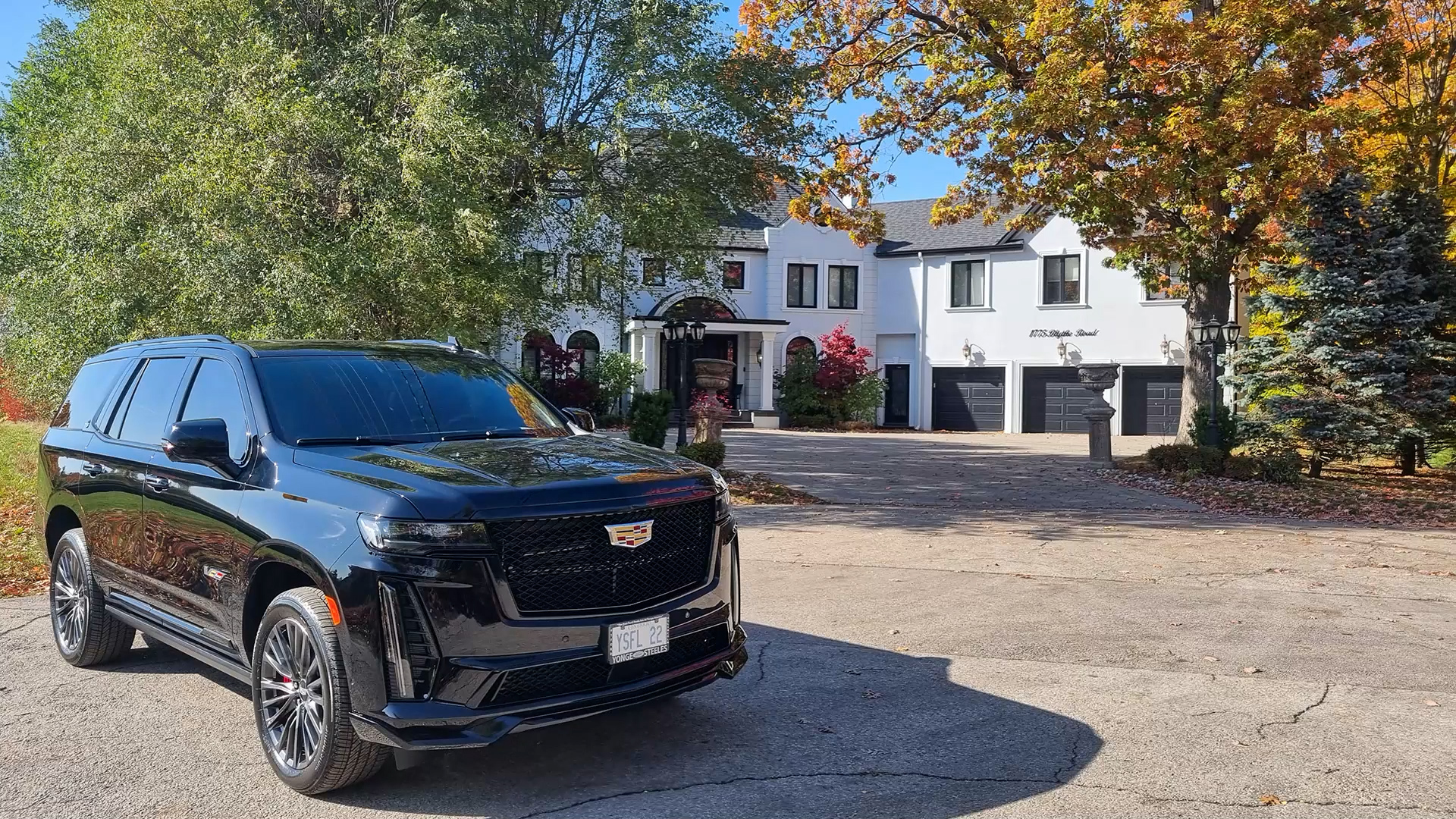 Escalade V at the mansion driveway
