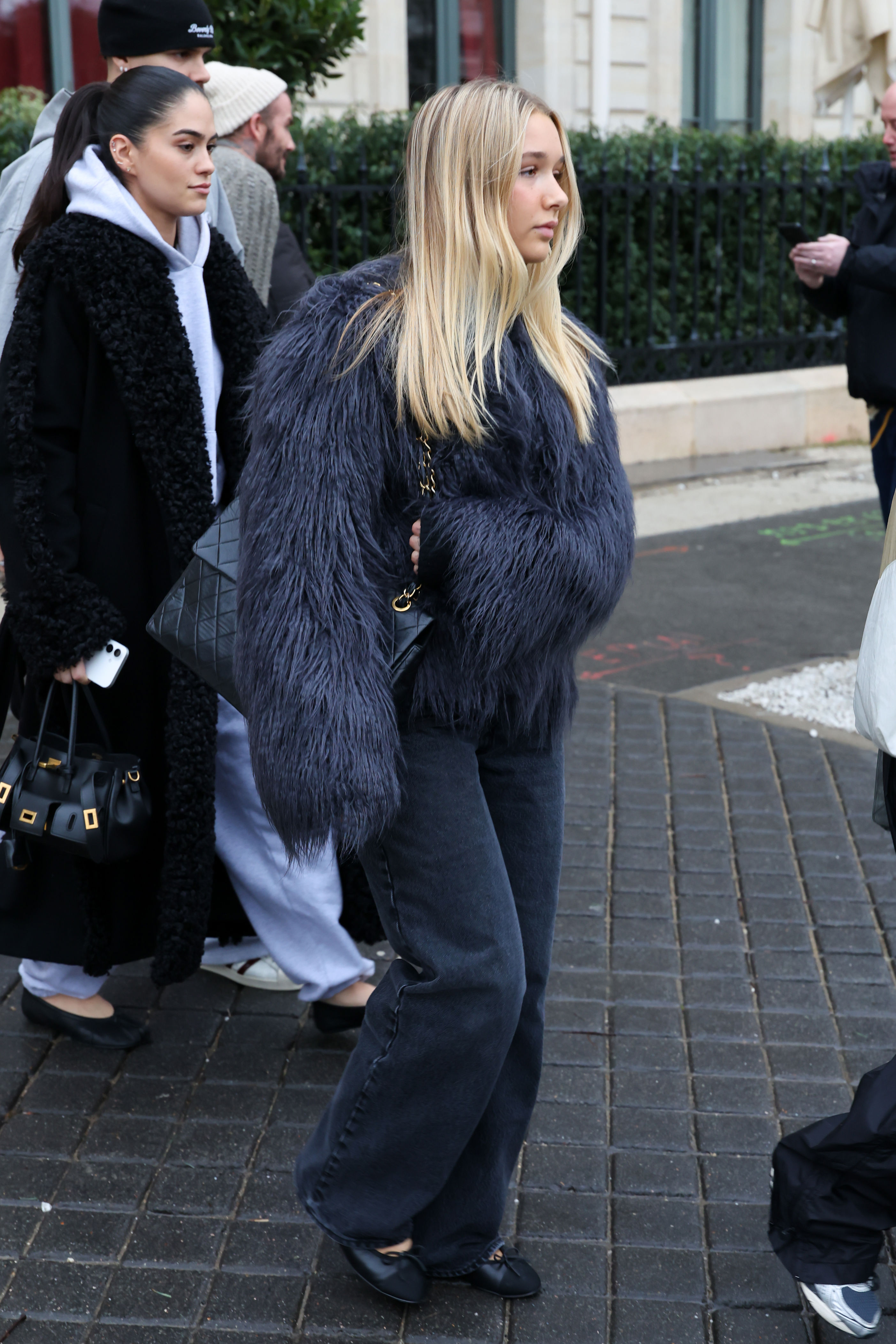 David and Victoria Beckham’s 14-year-old daughter, Harper, bundles up ...