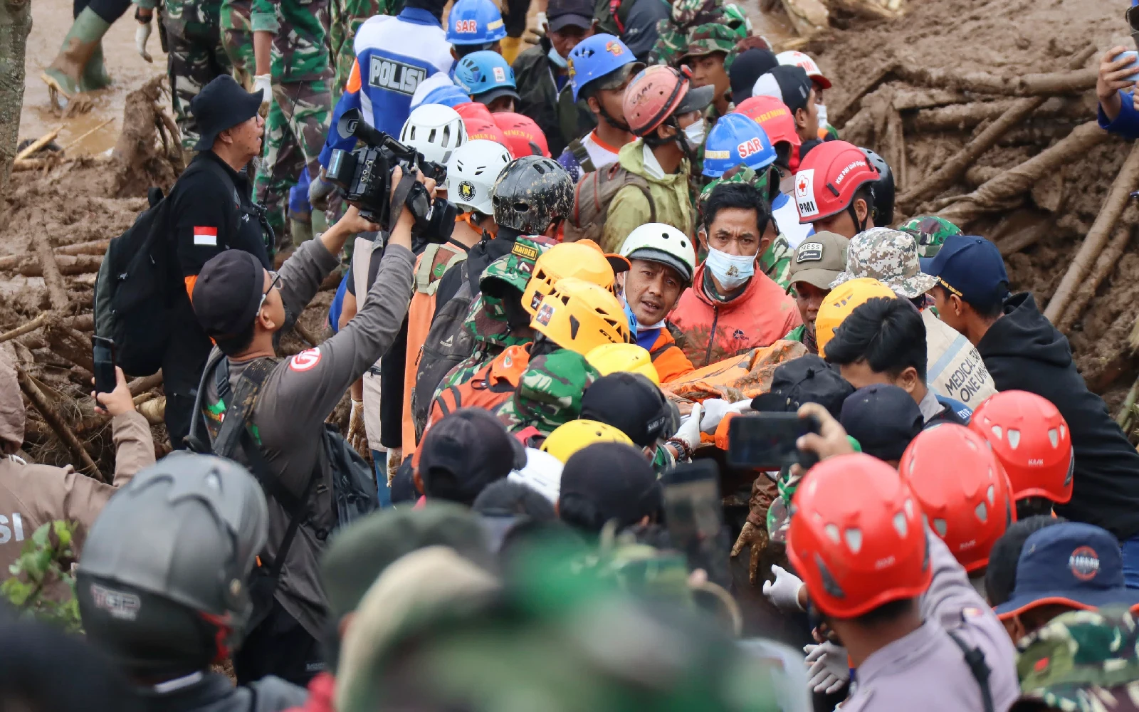 Search for 32 people missing in Indonesia after landslide hampered by ...