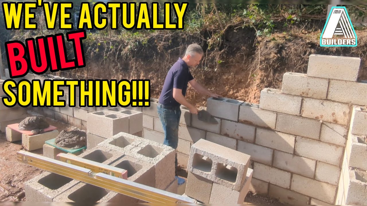 Building a retaining wall with the heaviest blocks ever | Extreme DIY ...