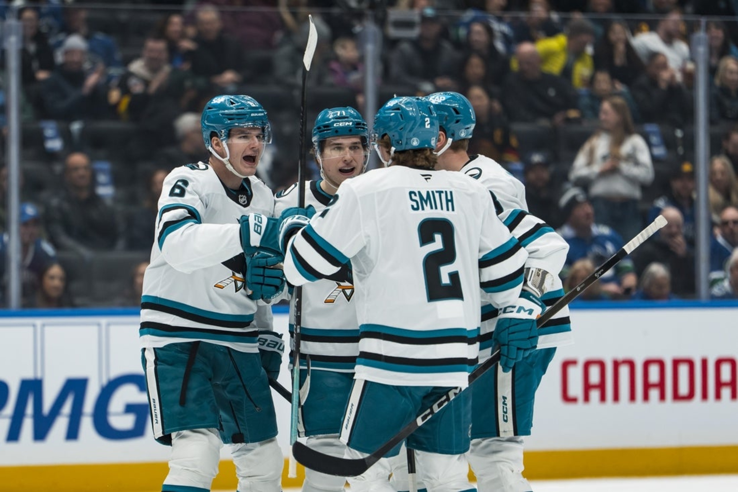 Sharks start fast, cruise past struggling Canucks