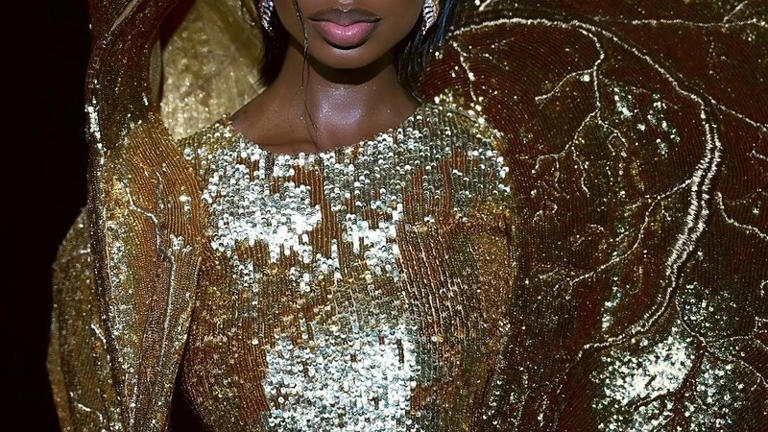 Olandria Carthen dazzles in golden glam at Rahul Mishra's Paris Couture ...