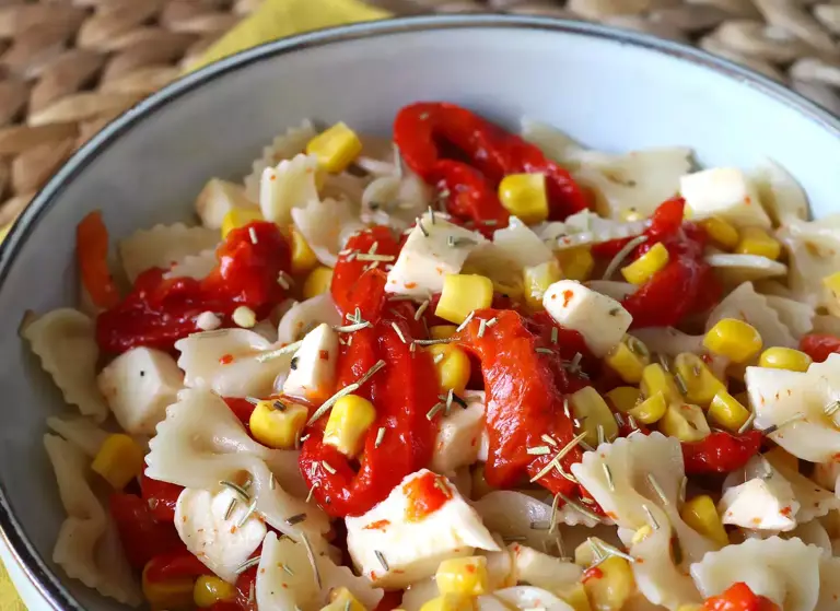 Cold pasta salad with peppers, corn and mozzarella