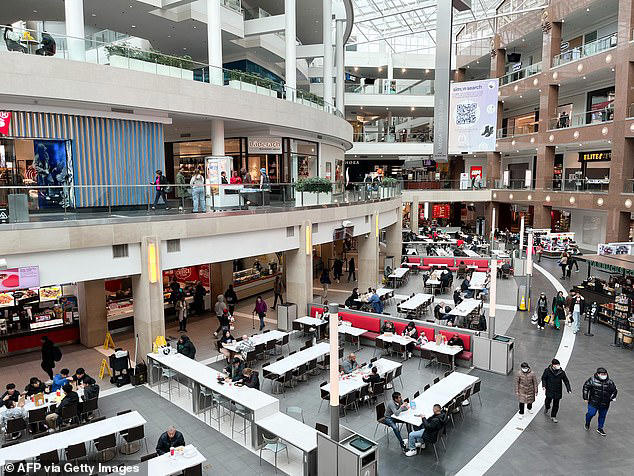 Man's decaying body is found inside storage room in DC mall just steps ...