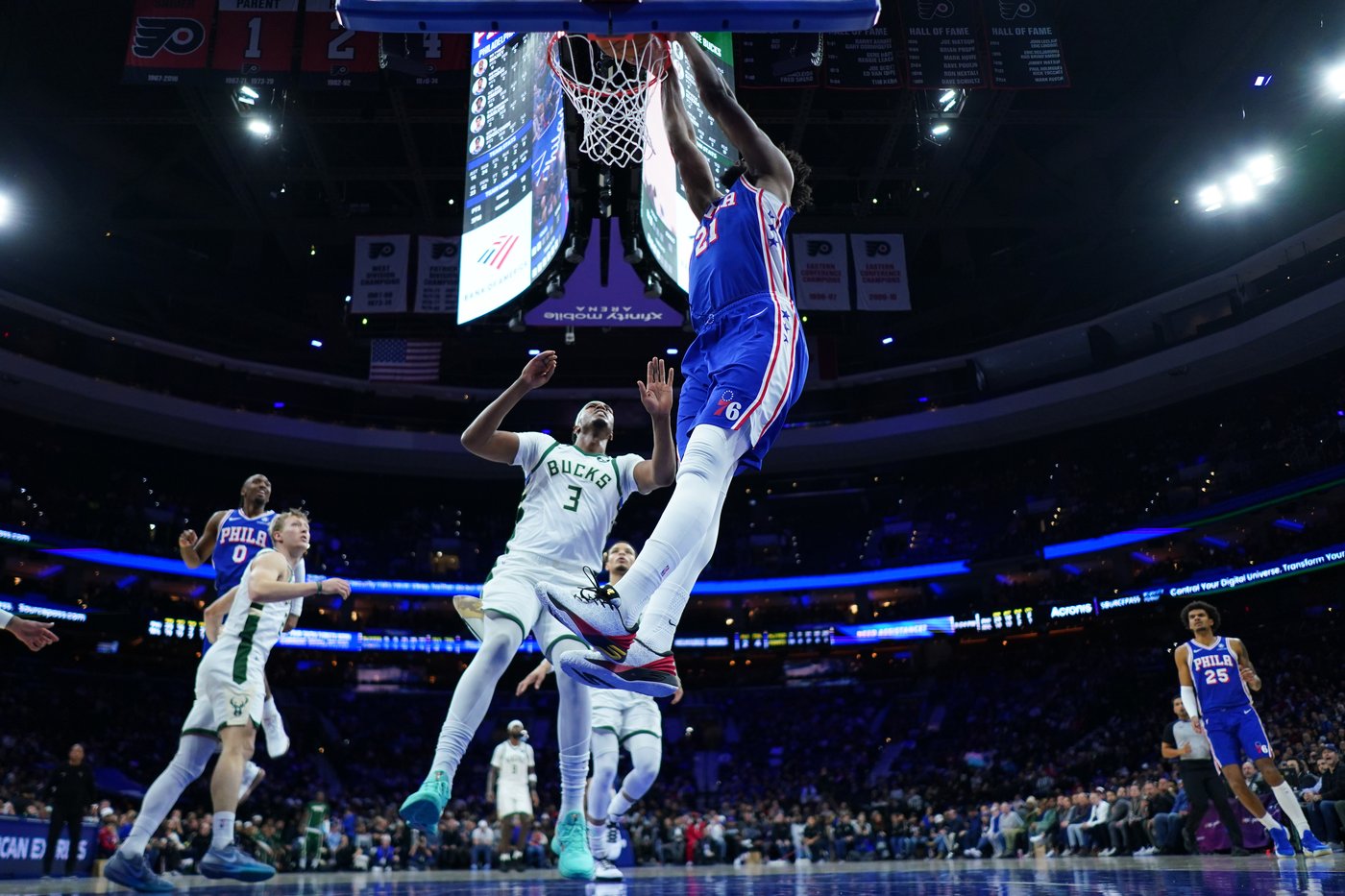 George scores 32 and Embiid has 29 to lead 76ers past short-handed ...