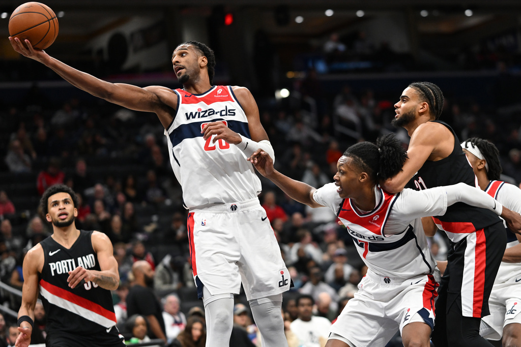 In a battle of young big men, Alex Sarr helps the Wizards snap a pair ...