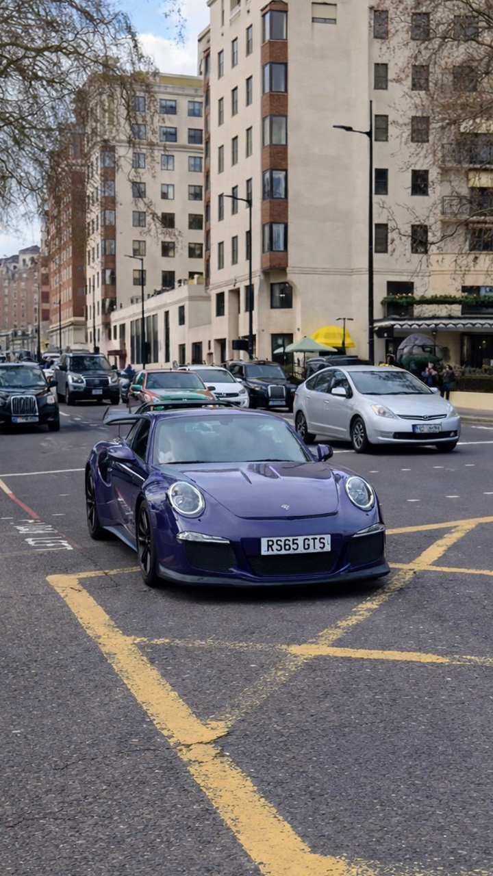 Purple Porsche GT3 RS seen on Park Lane