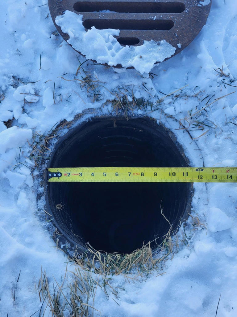 Teen gets stuck in 11-inch-wide drain pipe while sledding on Kansas ...