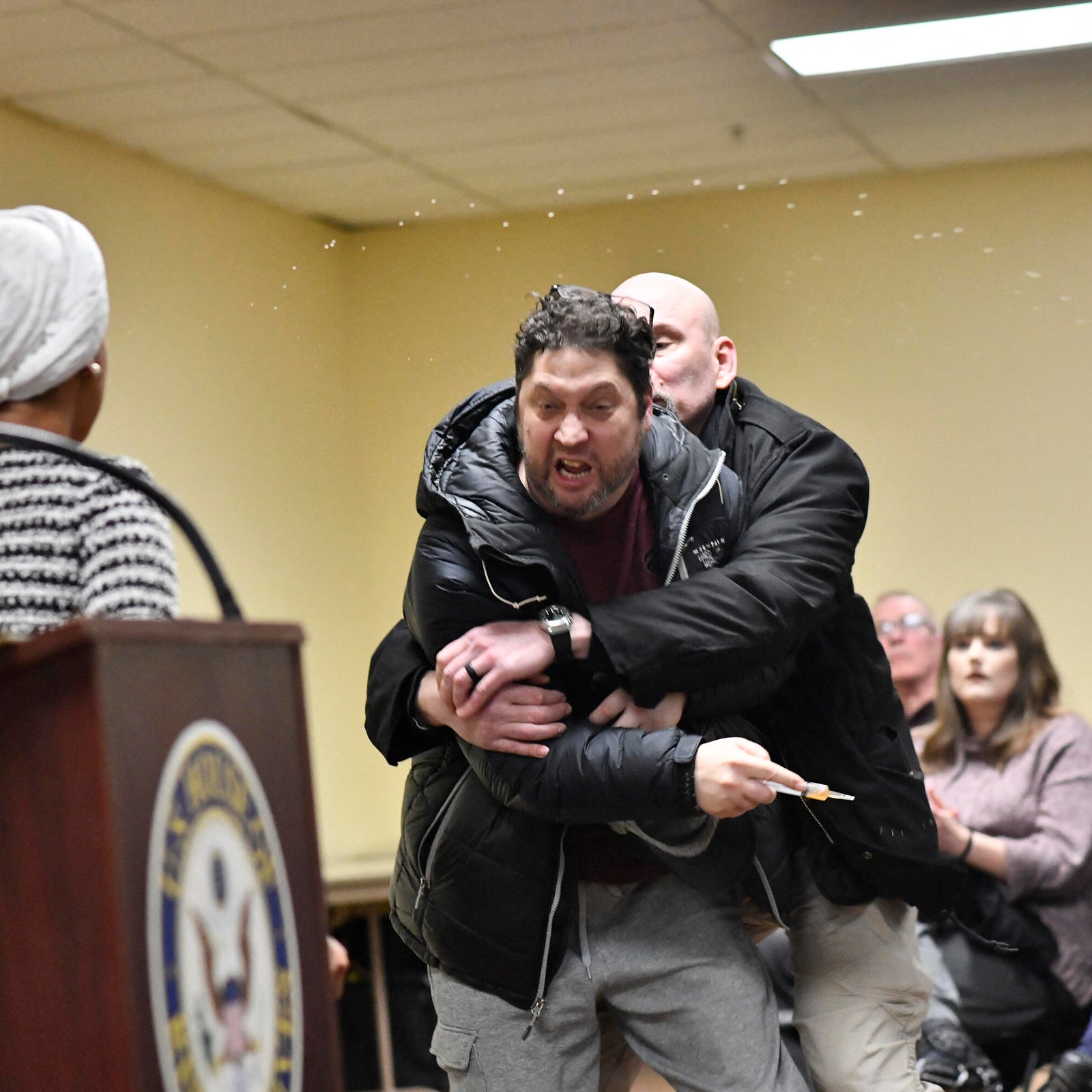 Man sprays Rep. Ilhan Omar with unknown substance at town hall
