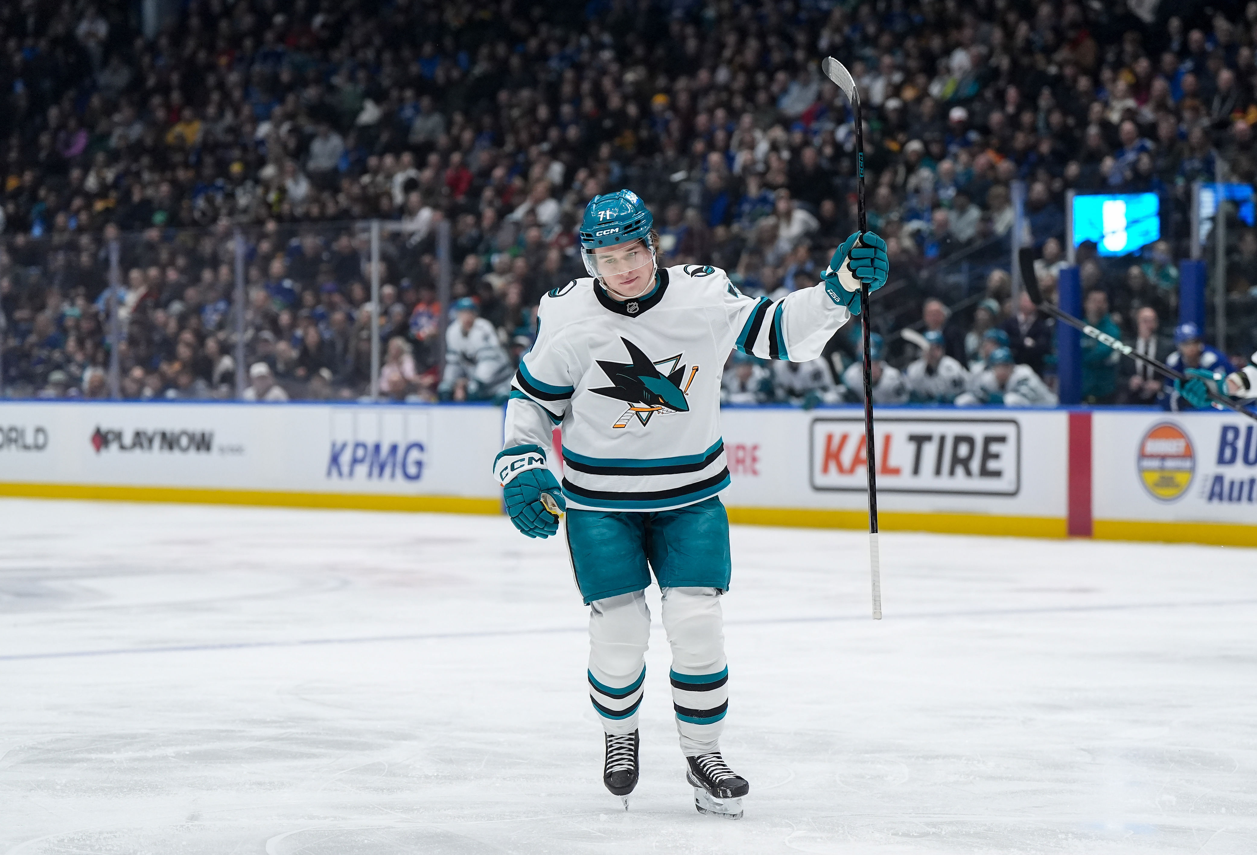 Celebrini's 4 points lead Sharks to 5-2 win over Canucks