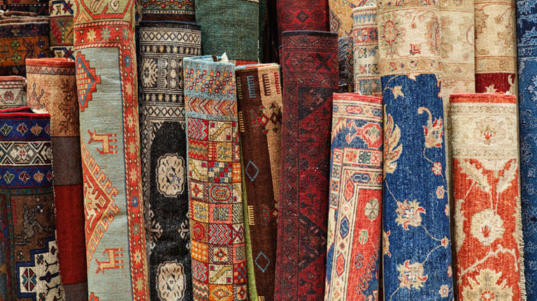How much does a custom-cut rug really cost? Here's what to know