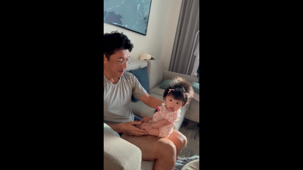 Baby looks like Monchhichi when she wakes up with spiky hair