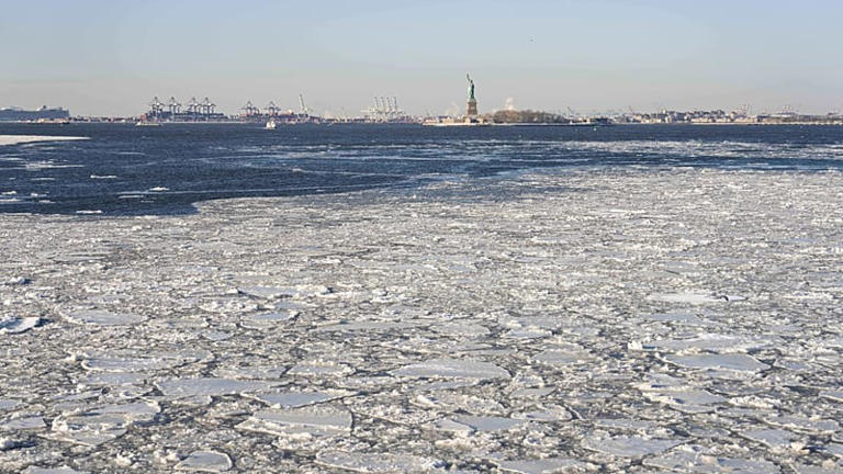 Bitter cold grips eastern US as ice forms on rivers