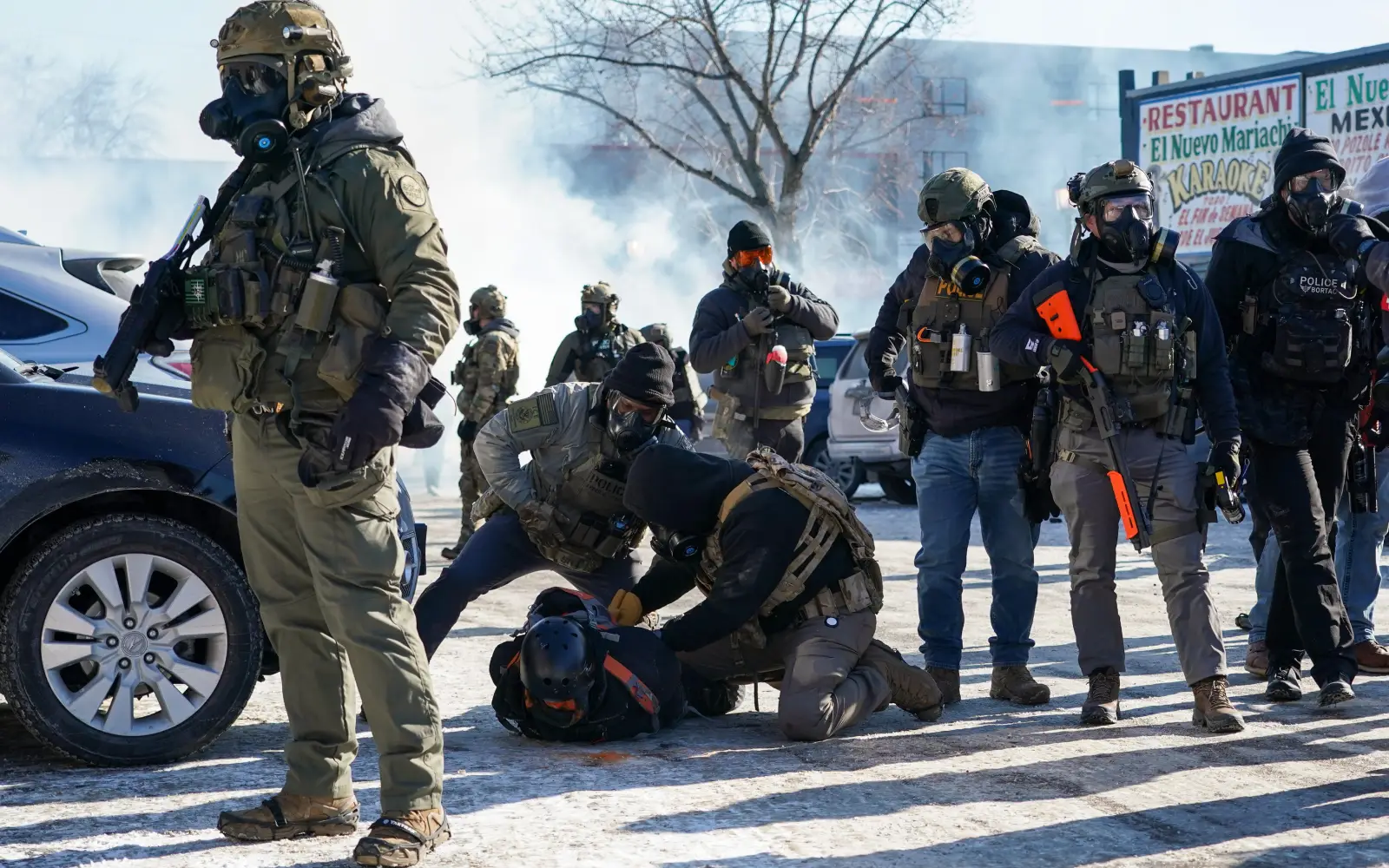 2 officers fired guns in Minneapolis killing, says DHS report