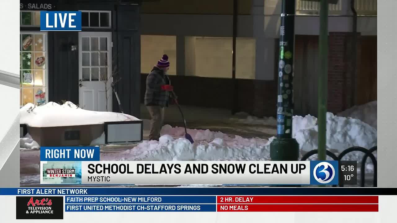 Crews work to haul snow out of downtown Mystic after Winter Storm Benjamin
