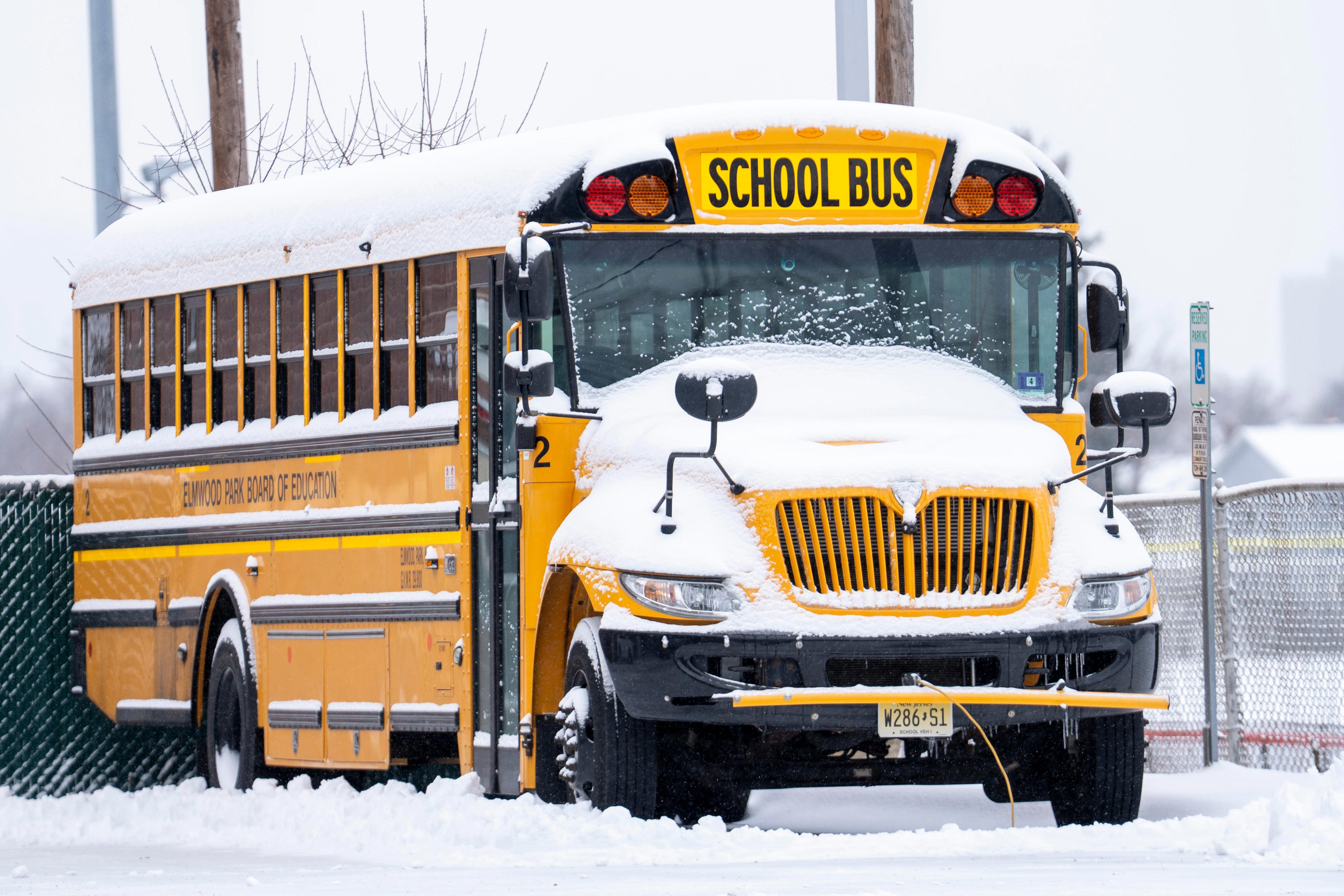 Plymouth-Canton school bus overturns in crash; no students aboard
