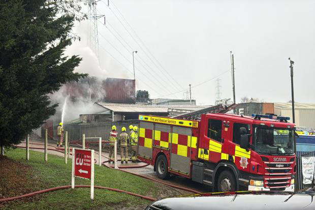 Firefighters remain at scene of car repair garage fire in Colchester