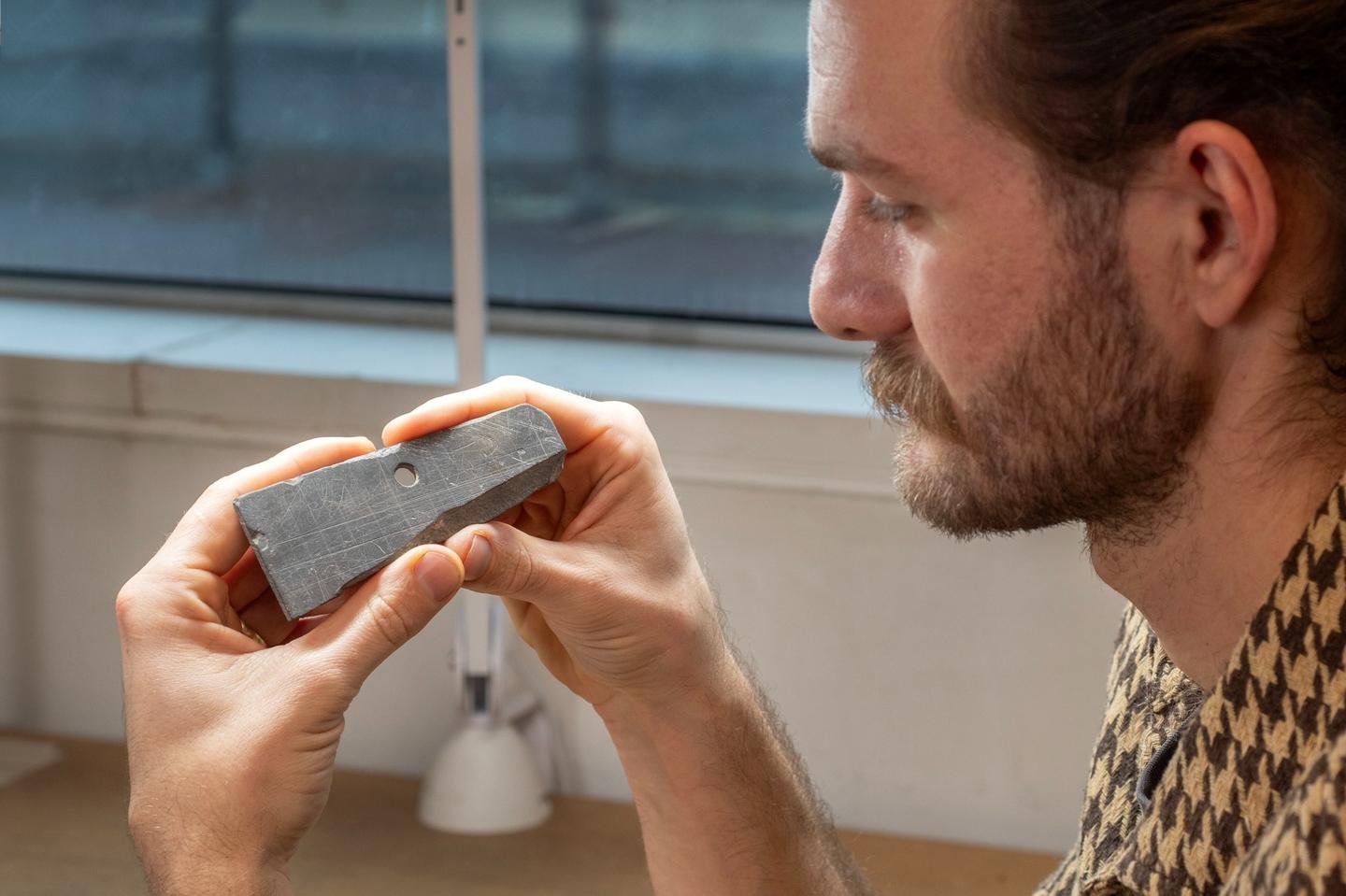 Archaeologists unearth a reusable school slate still covered in the ...