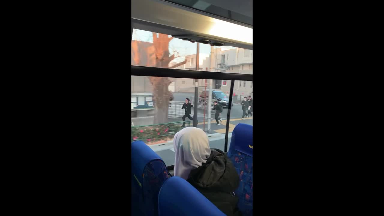 Japanese students chase bus to wave goodbye to Indonesian exchange pupils
