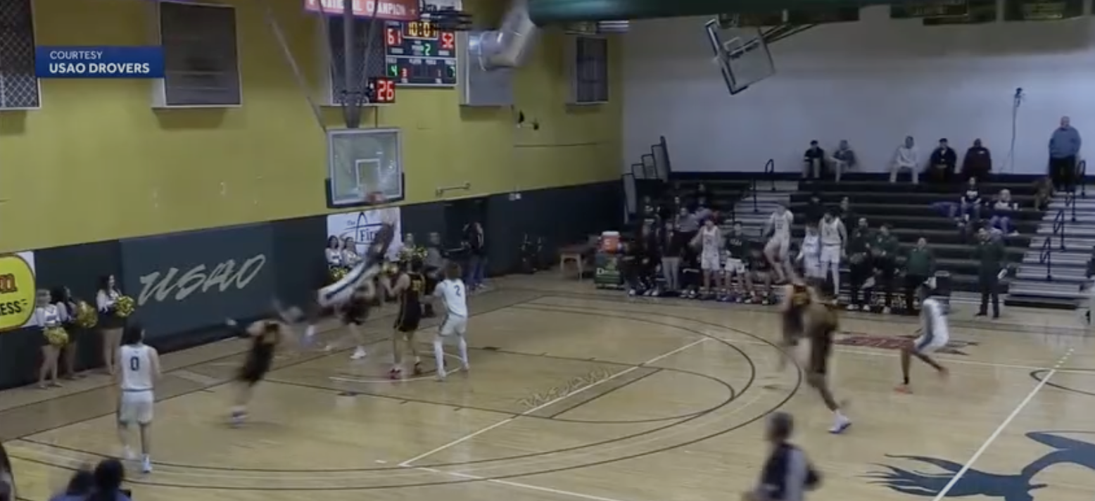 College basketball player shatters backboard with dunk