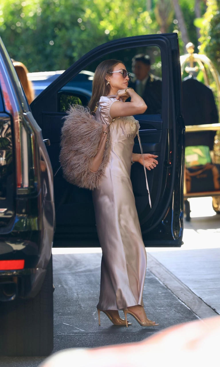 Jennifer Lopez steps out in a satin gown as son Max channels dad Marc ...