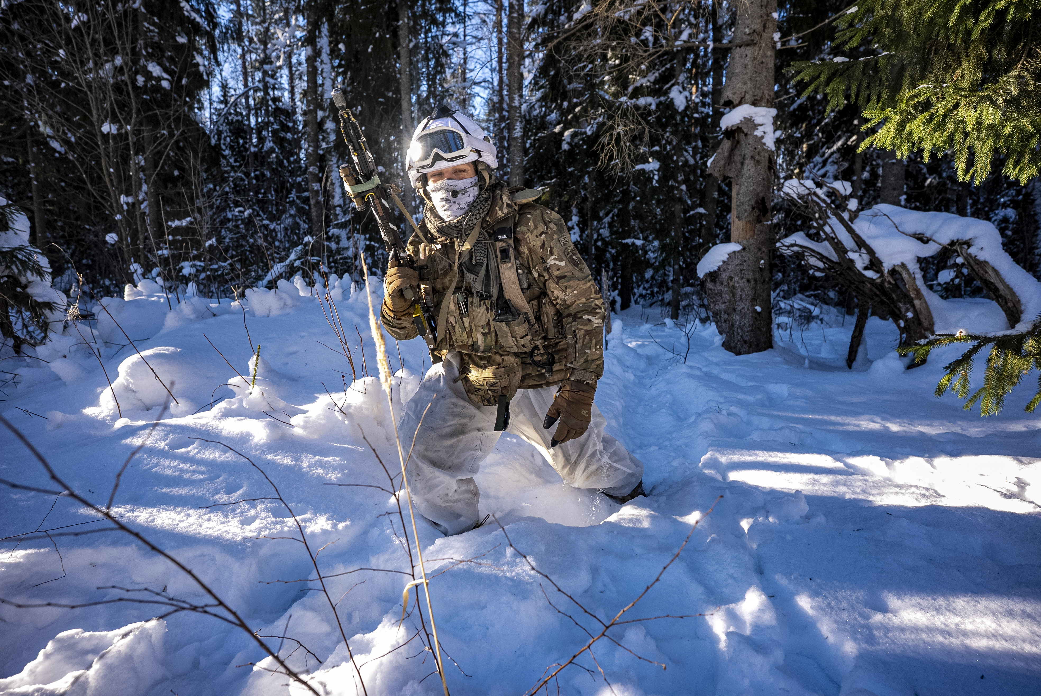 Soldiers wade through 'chest-deep' snow during training close to ...