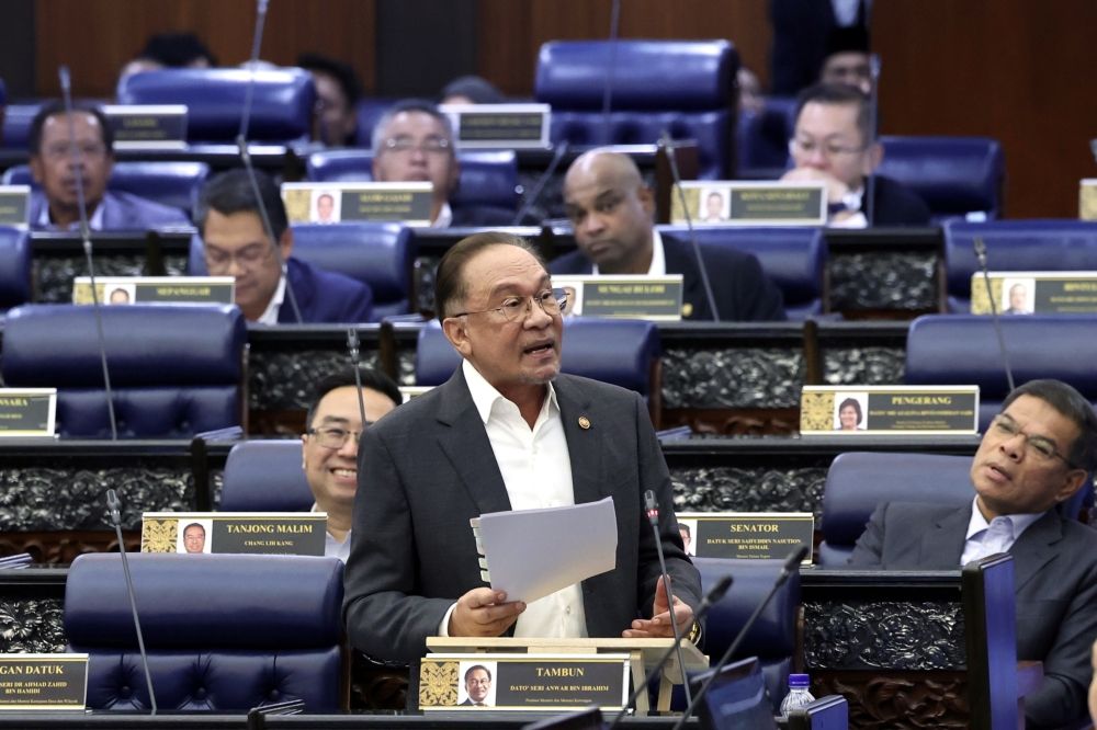 Anwar denies ceding land to Indonesia, says Sabah border based on ...