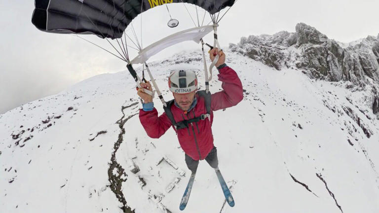 Daredevil becomes first to ski-BASE jump off Mount Snowdon