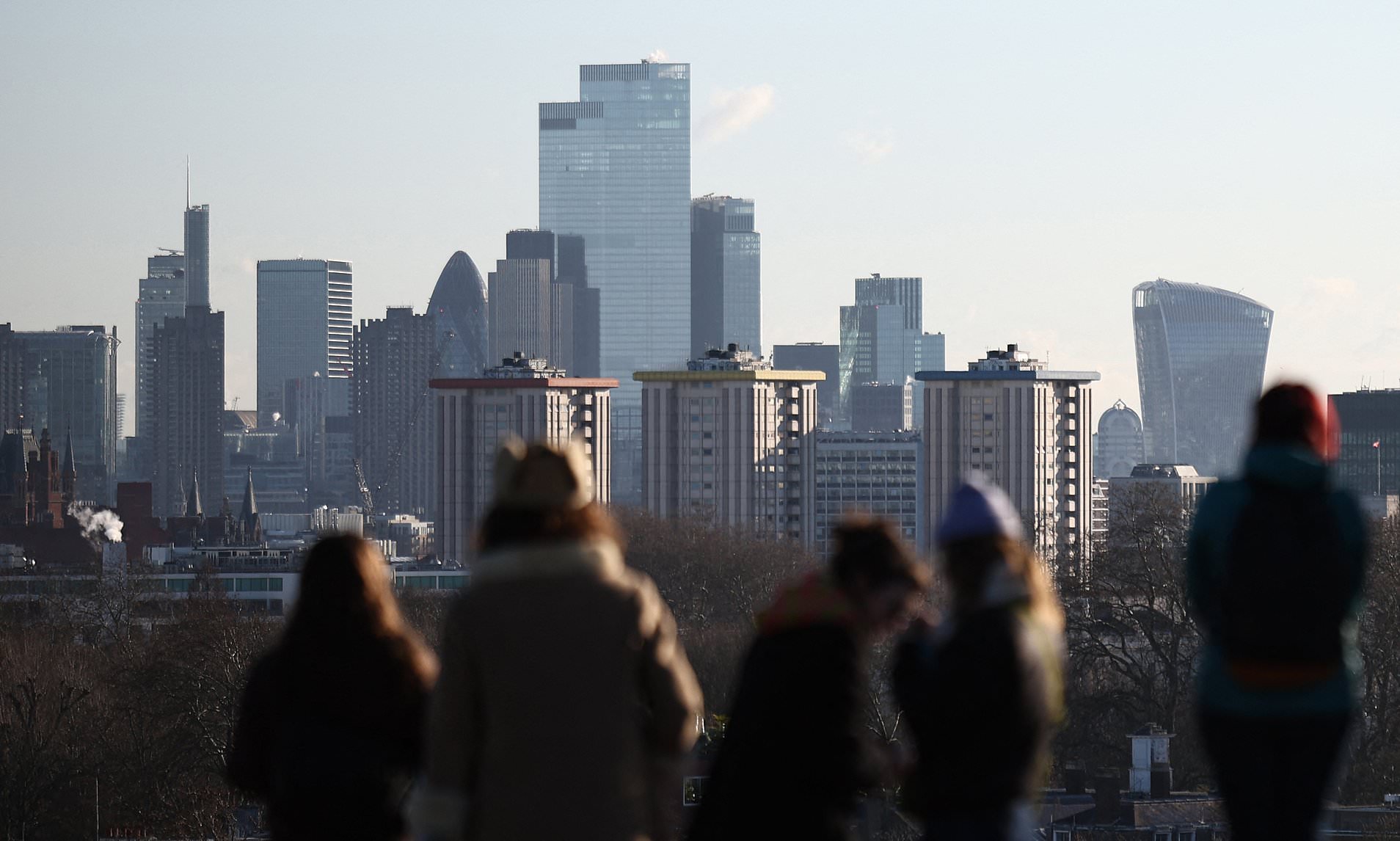 FTSE 100 hits record high and surges past 10,400 points despite AI woes