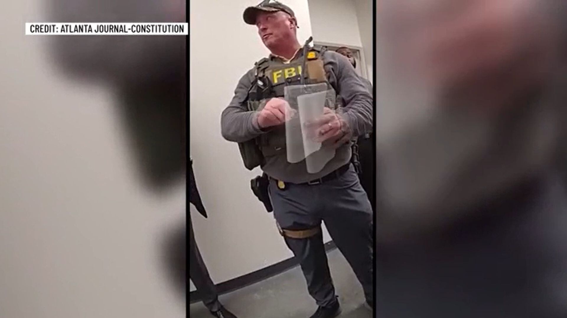 Body camera video shows initial moments of FBI raid at Ga. elections hub